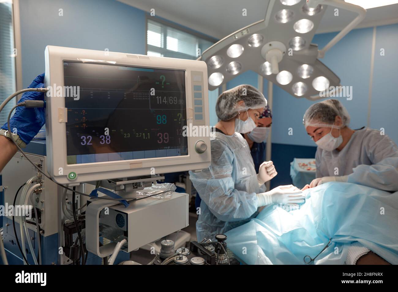Monitoring of patient's heart in intensive care unit in operating room ...