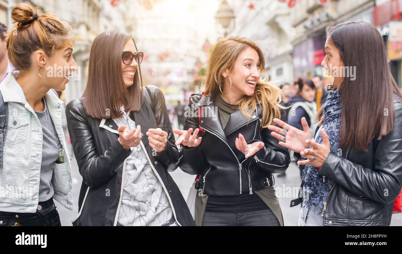 Happy girls friends talking online hi-res stock photography and images ...