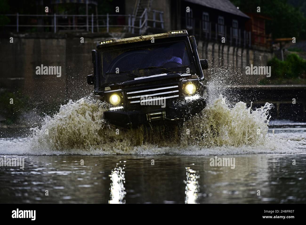 Mud and water splash in off-road racing. Mud and water splash in off ...