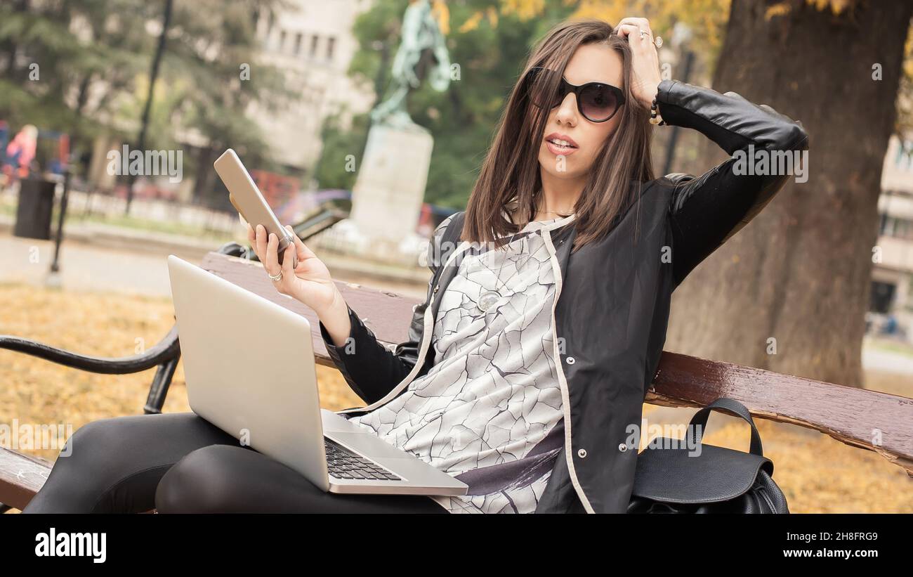 Hysterical young girl with too many screens, mobile phones, tablets and ...