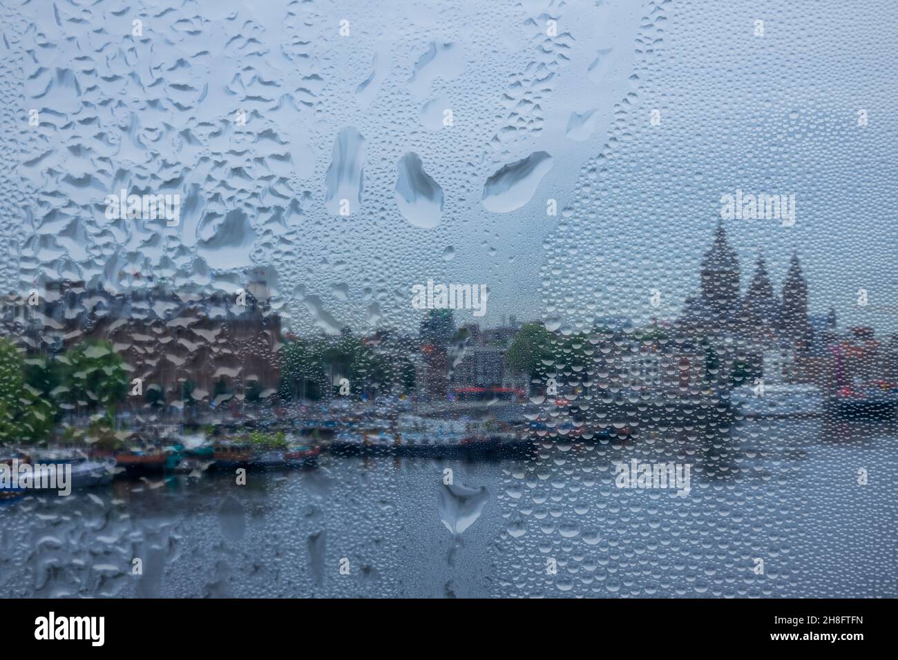 Netherlands. Panorama of Amsterdam in rainy weather from a high point ...