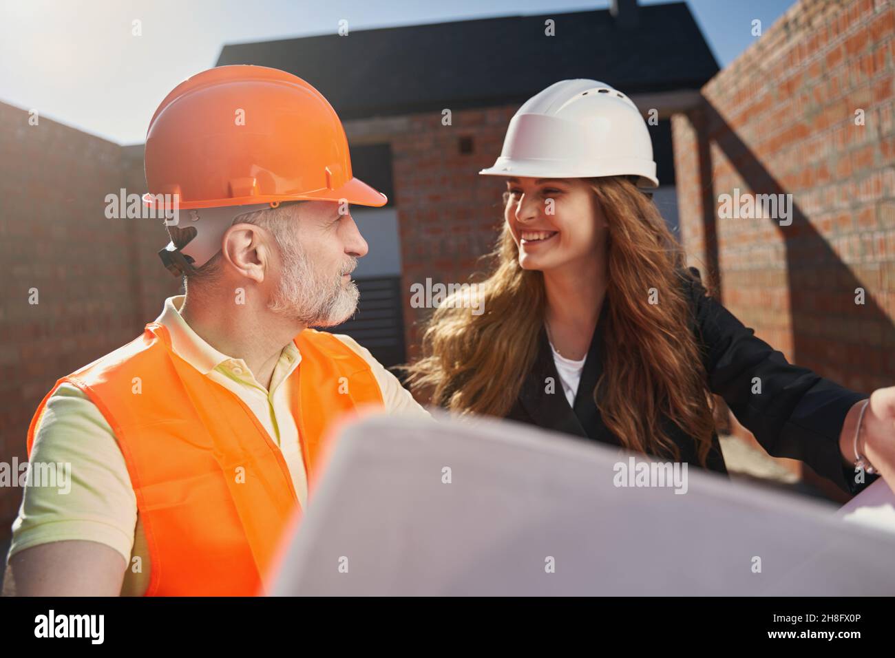 Team work and collaboration of architects at the building site Stock ...