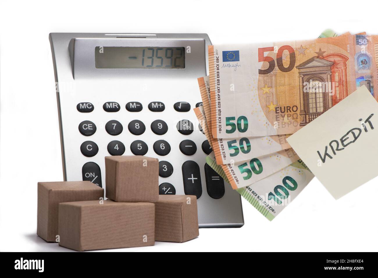 Calculator showing debts with parcels and cash and note with ...