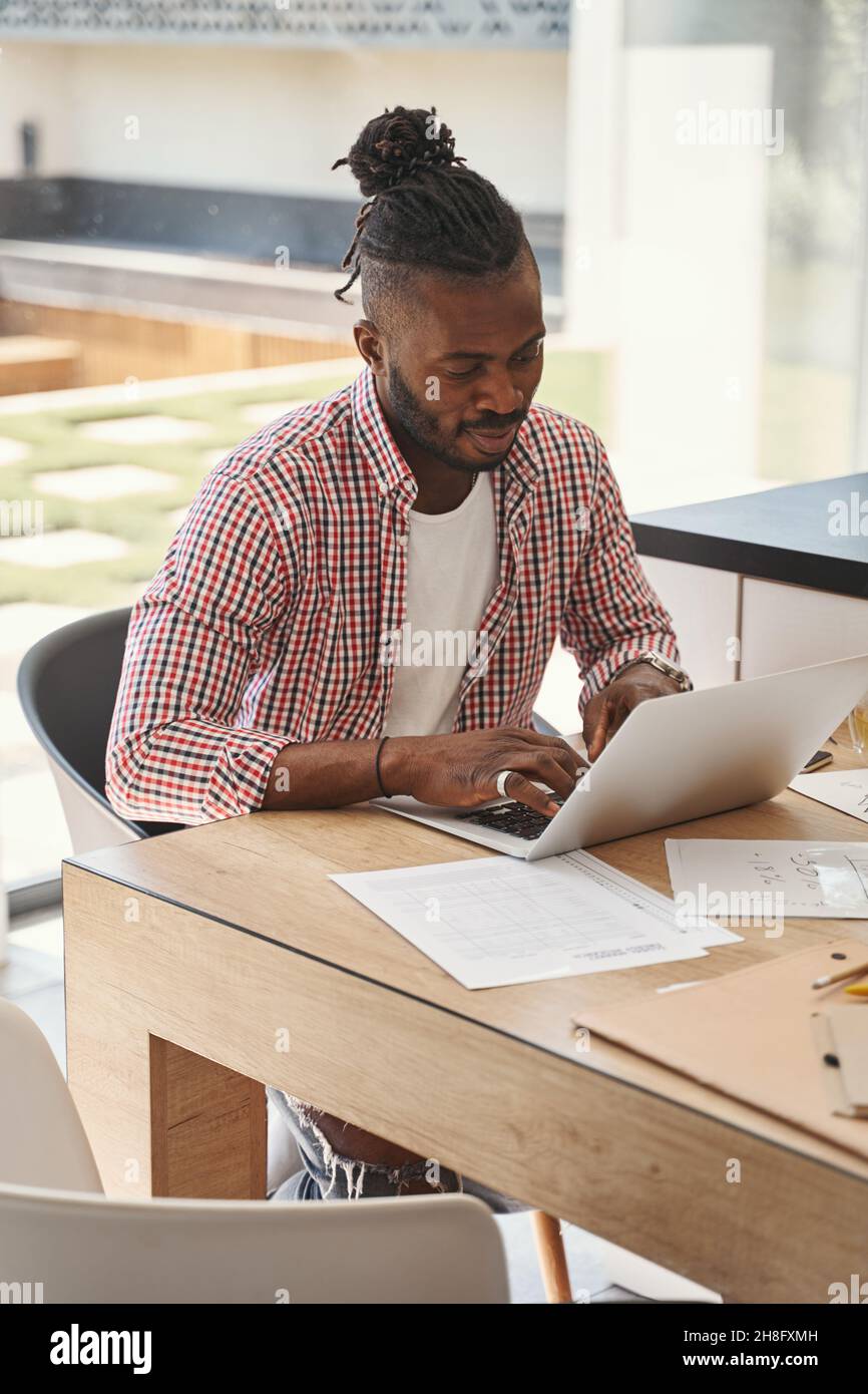 Focused young man hi-res stock photography and images - Alamy