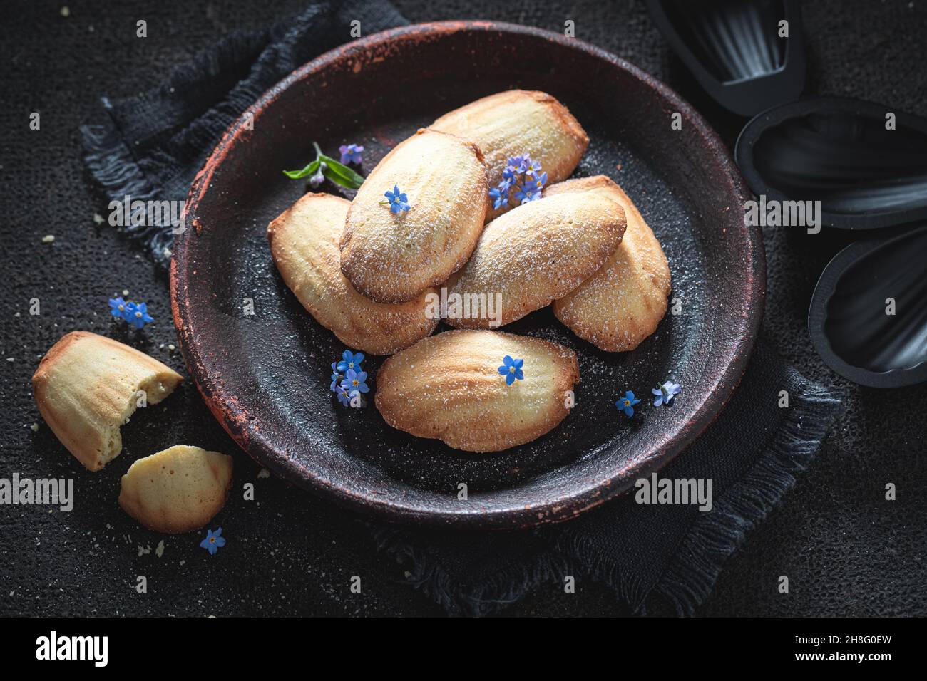 Classic Madeleine cookies baked in fluted tin. Small french snack ...