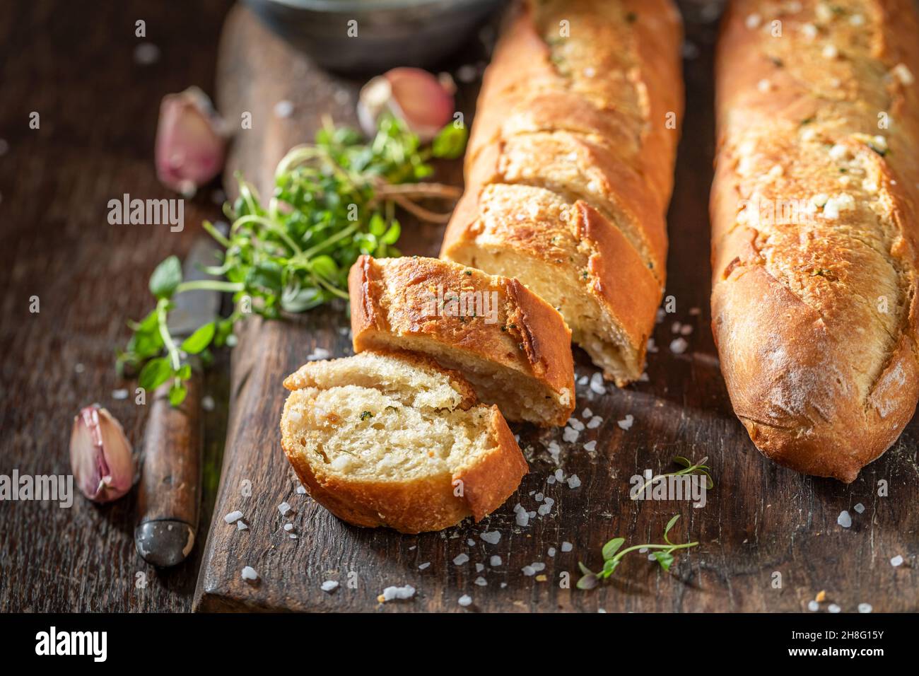 Homemade garlic bread with salt. Baguette with garlic. Italian cuisine ...