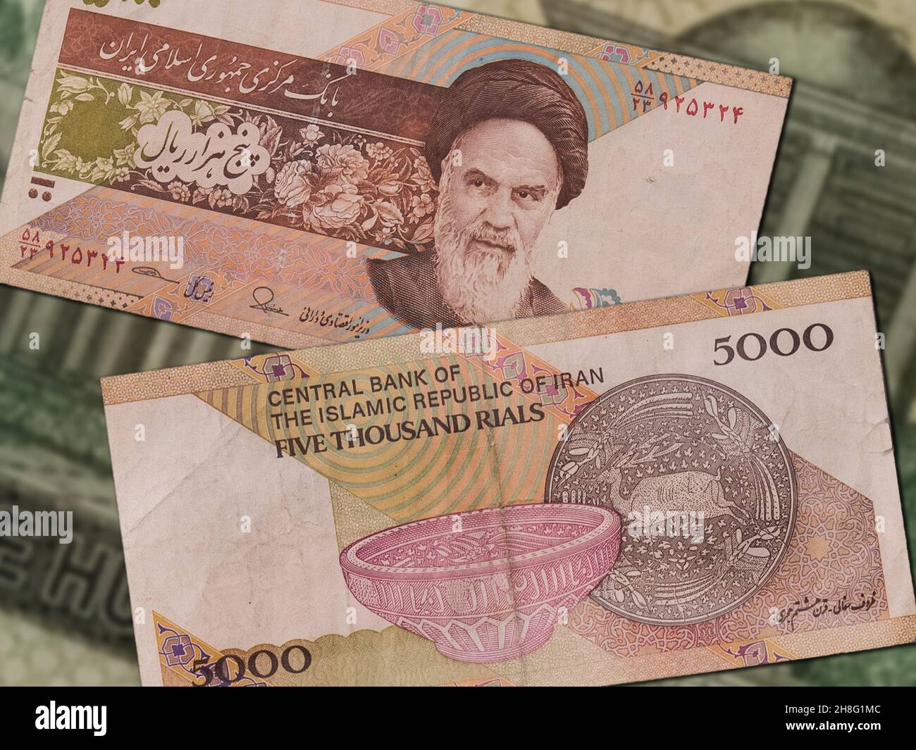 Iran Rial banknotes depicting Ayatollah Khomeini on the table Stock ...