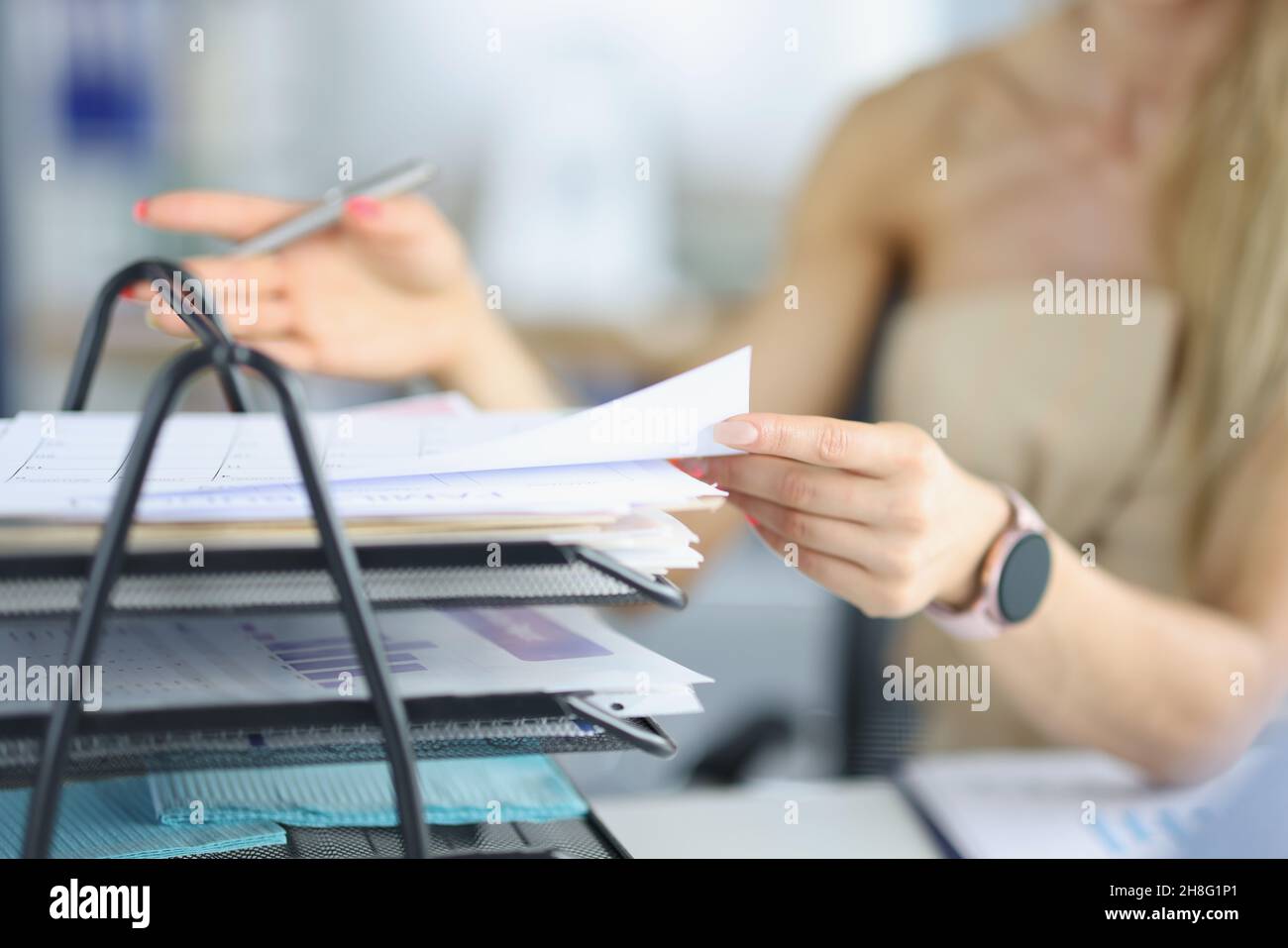 Female busy with papers on workplace, documents and problem projects ...