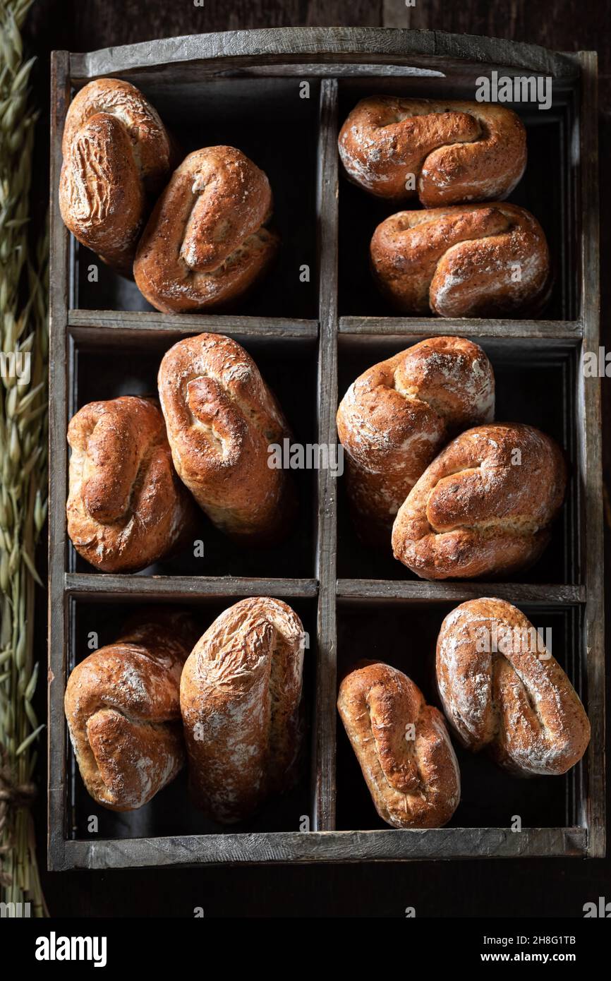 Rustic buns made of wheat grains. Buns from the bakery. Group of many ...