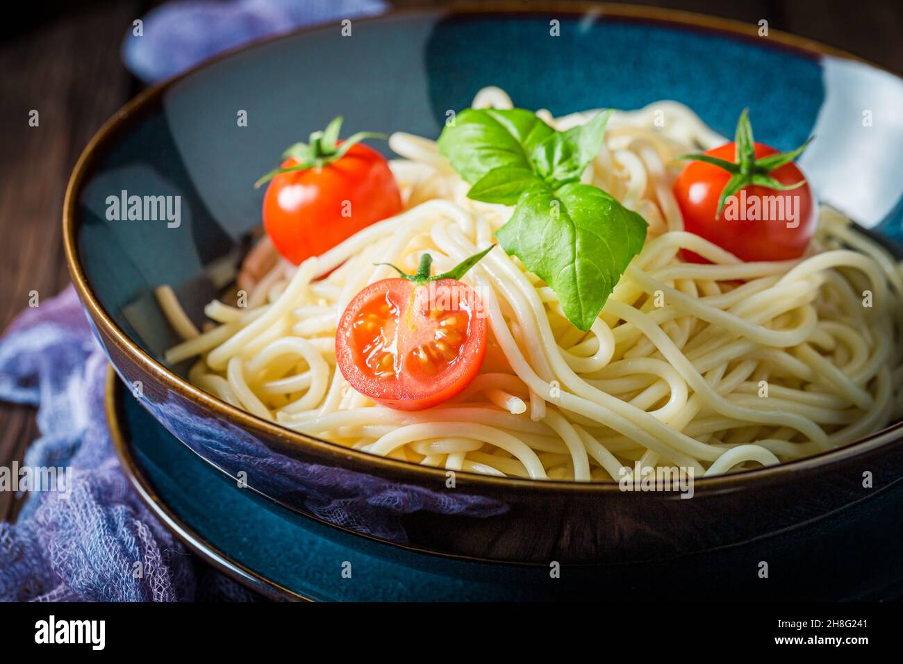Spaghetti with tomatoes, parmesan and basil. Classic Italian dinner ...