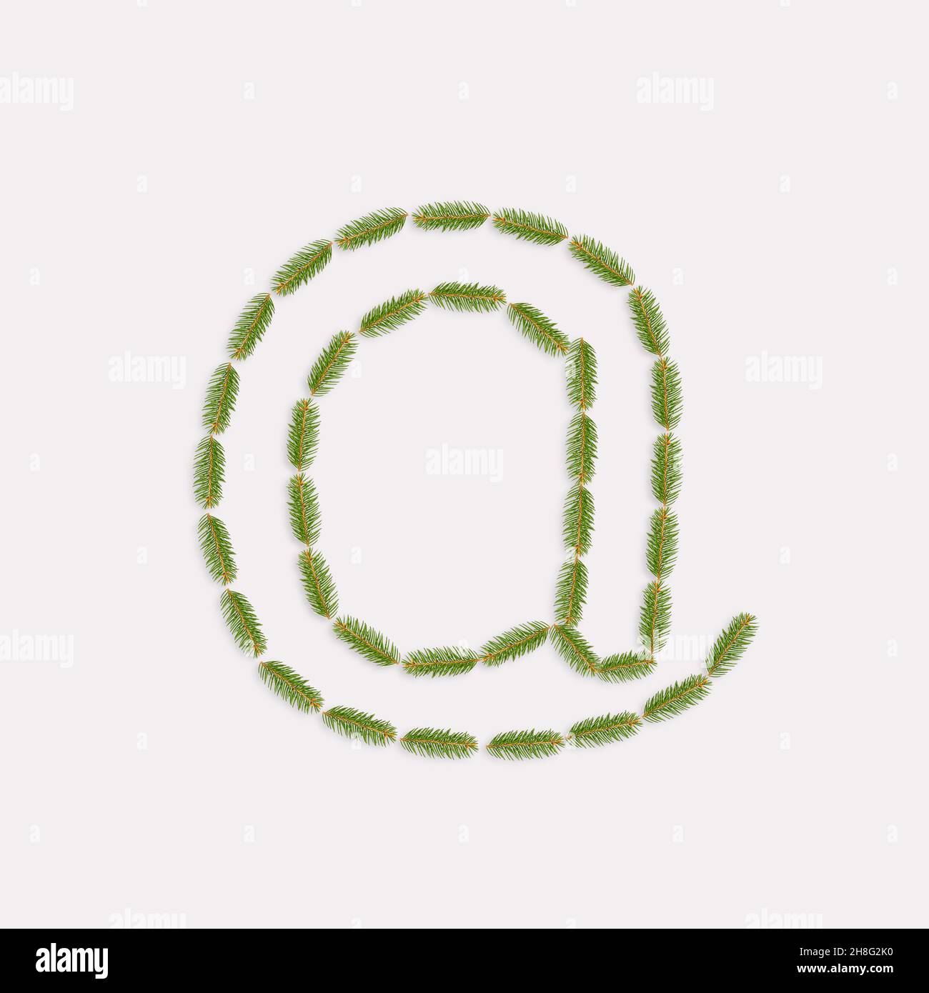 Design of At sign symbol made of branches isolated ona white background ...