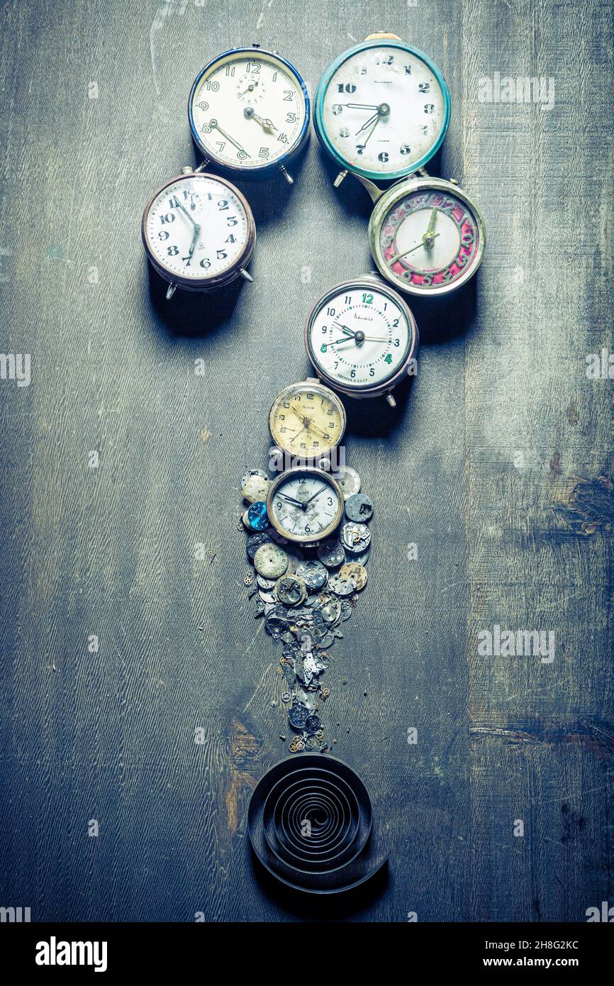 Questions mark arranged by clocks. Parts of the old clock Stock Photo ...