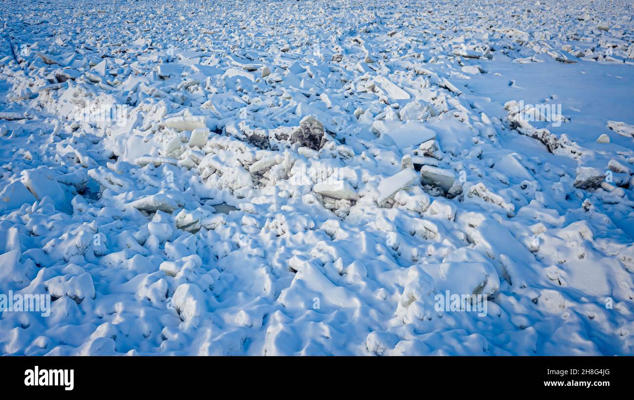 Ice jam on cold river in winter. Vistula river in winter. Poland in ...