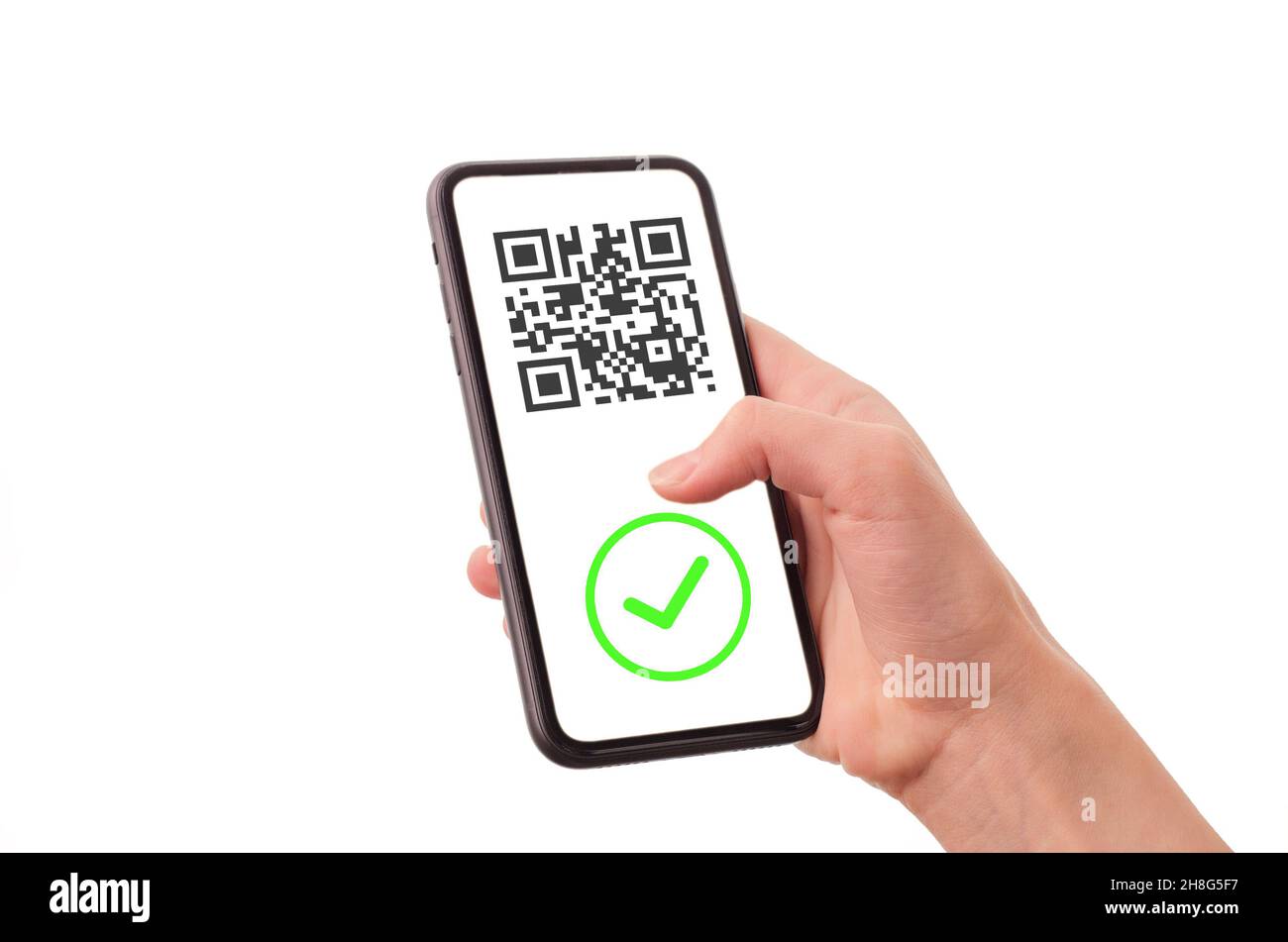 Woman's hand holds a phone with a vaccination certificate on a white ...