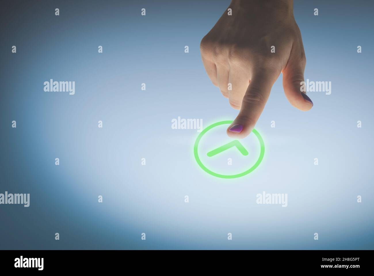 Woman hand pressing a green validation button, image concept of ...