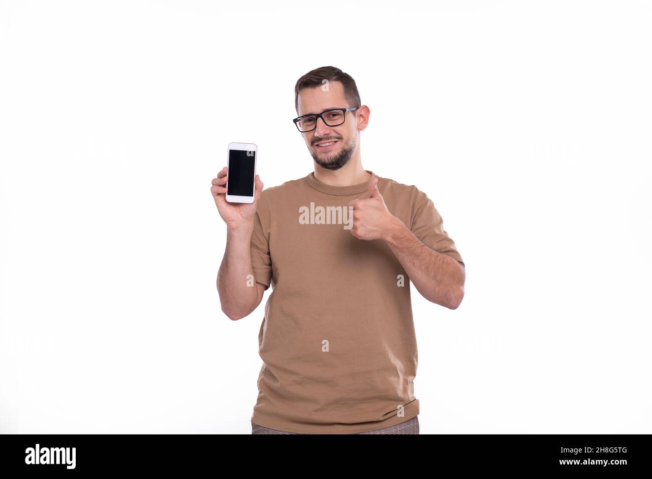 Man Holding Phone and Showing Thumb Up Isolated. Man Phone in Hands ...