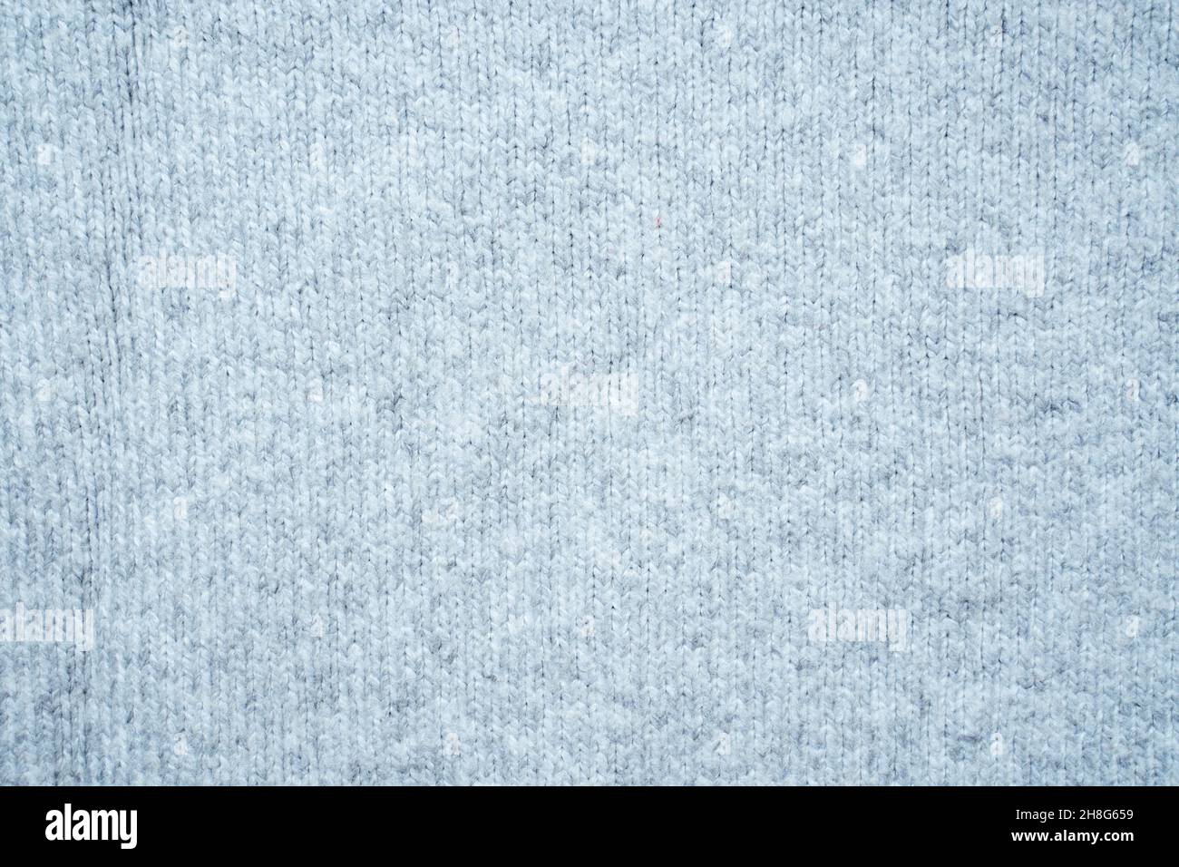 light grey knit sweater background. Cozy nordic background. Ornate wool ...