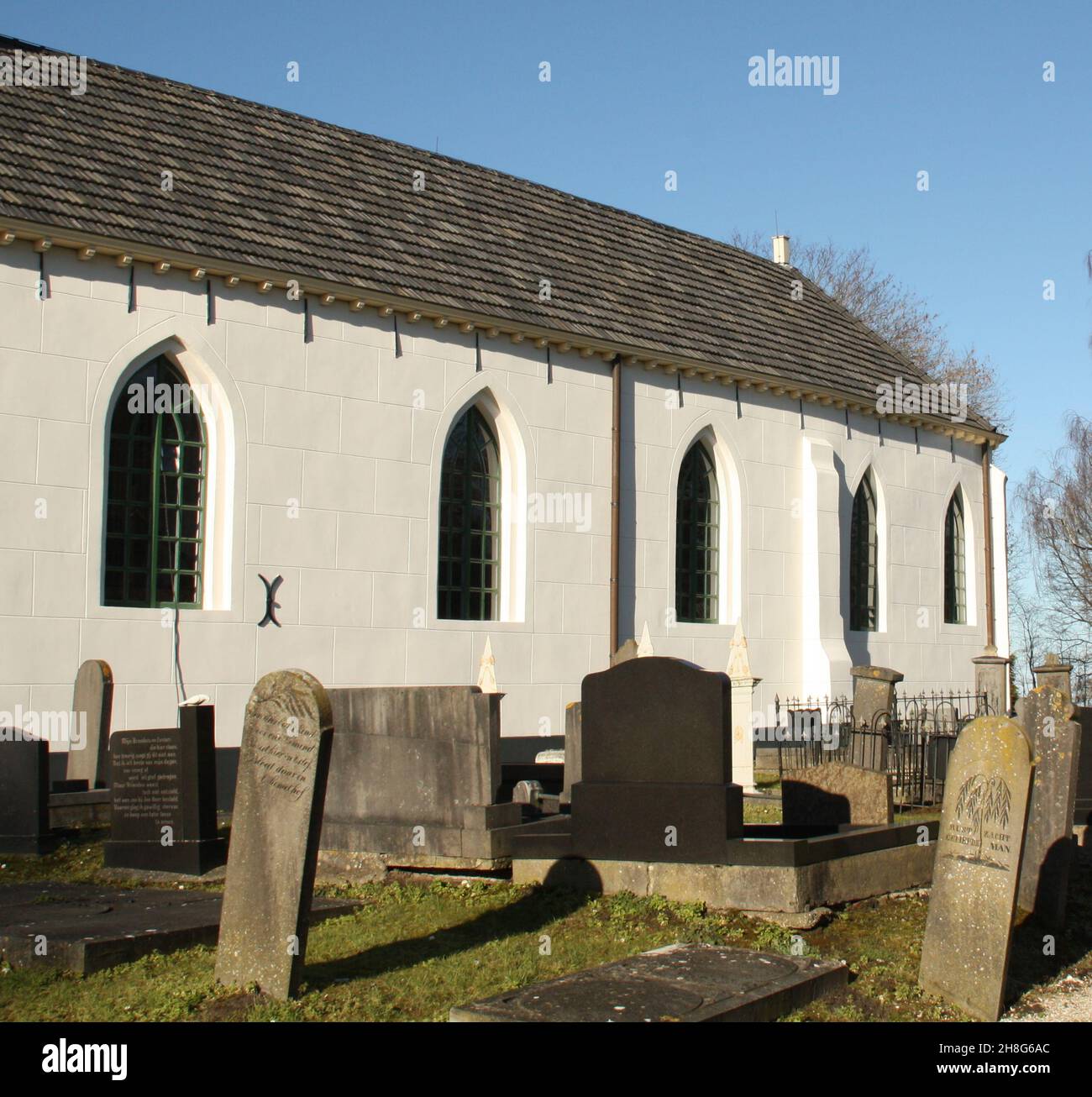 Engelbert. February-28-2016. white church and cemetery from the 13th ...