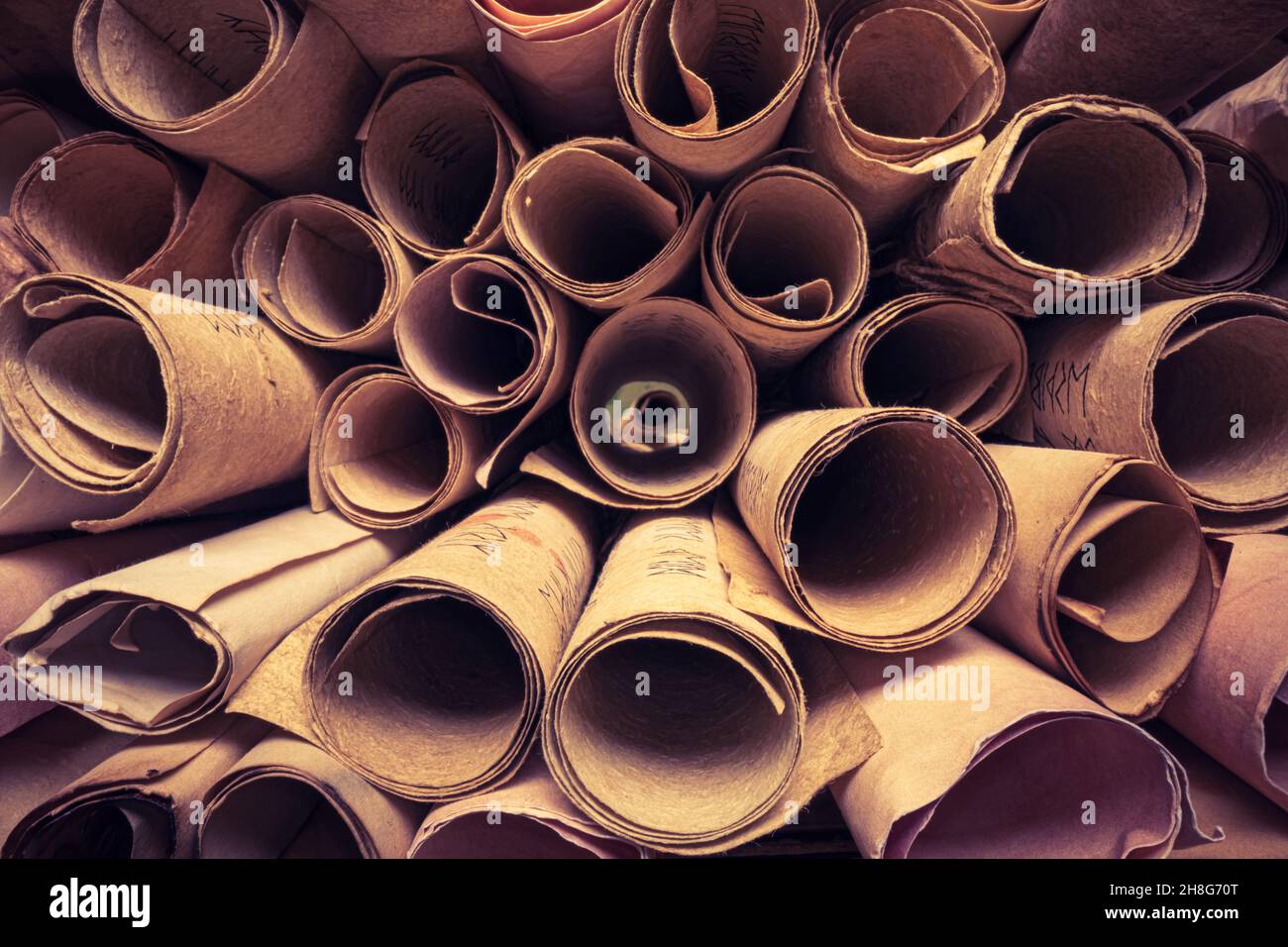 Old scroll library. Stack of ancient scrolls. Medieval manuscripts ...
