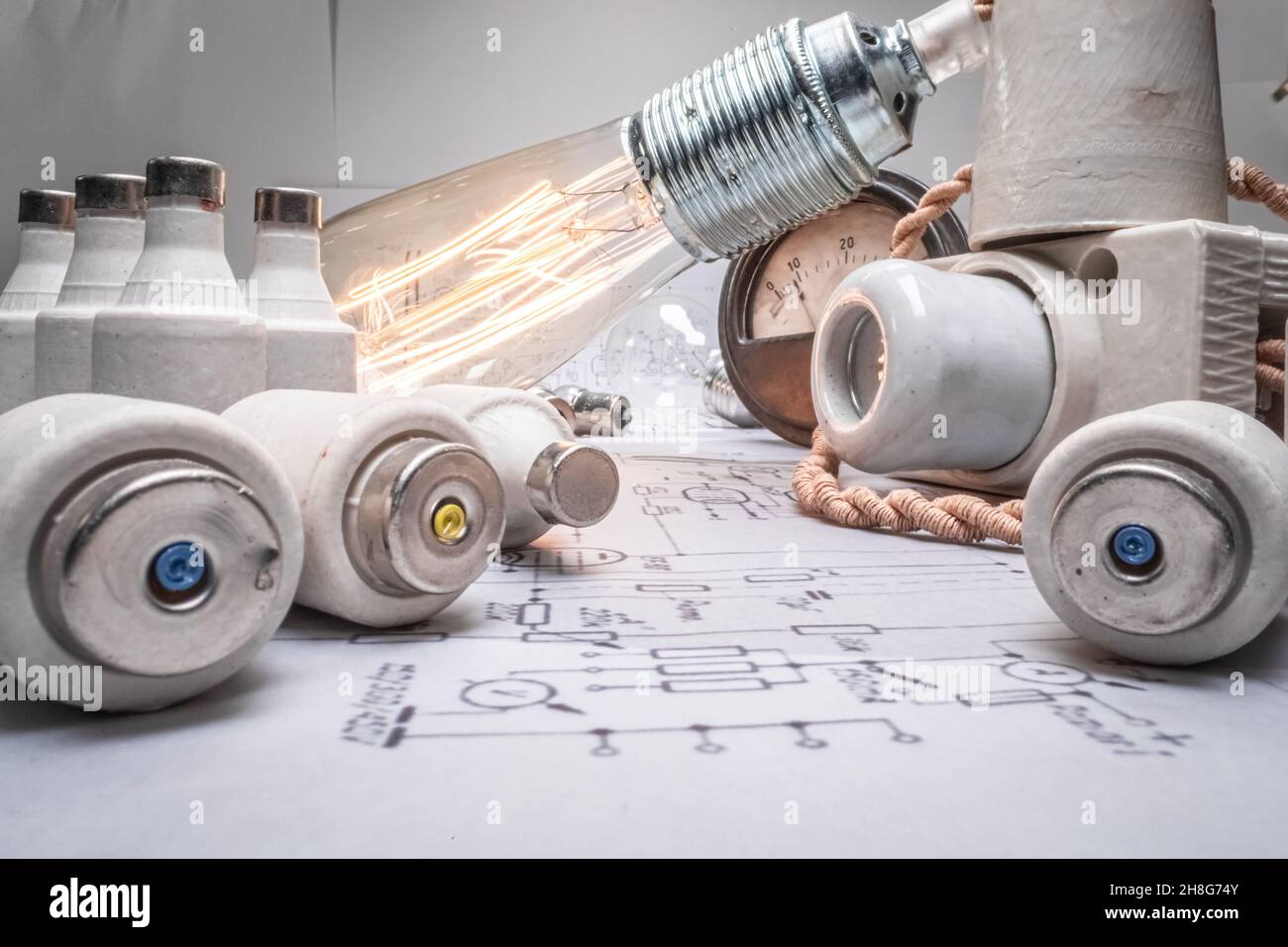 Low voltage light bulb with cables, fuses, diagrams. Old fashioned ...