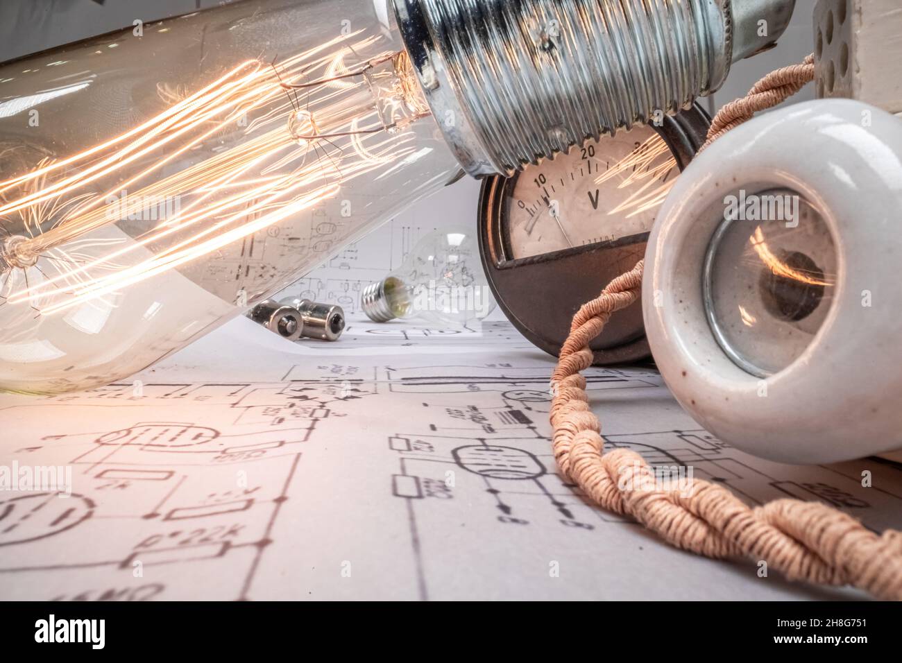 Edison light bulb with fuses, cables and diagrams. Old fashioned crafts ...