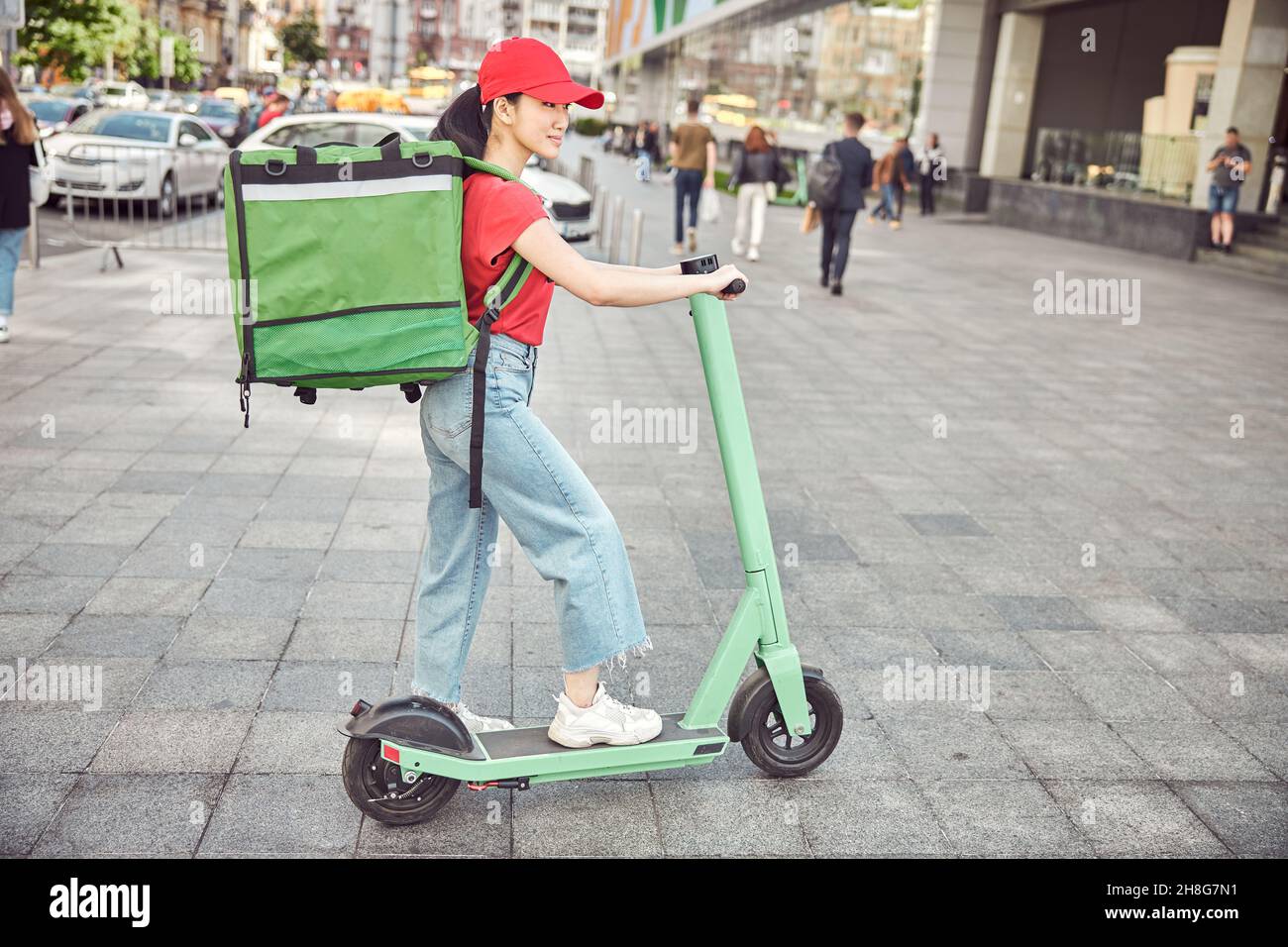Woman delivering food hi-res stock photography and images - Alamy