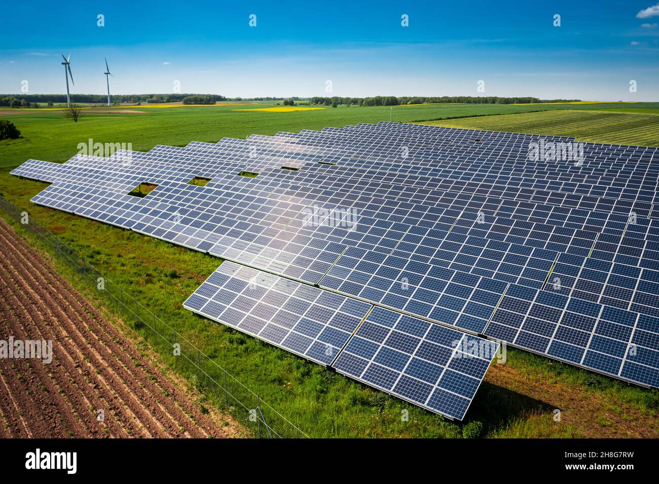 Big and blue solar panels as a renewable energy source. Pure energy in ...