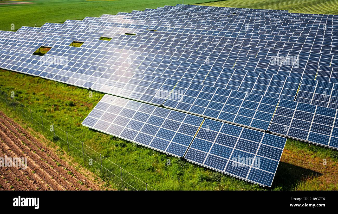 Big and blue photovoltaic farm as zero emission energy. Pure energy in ...