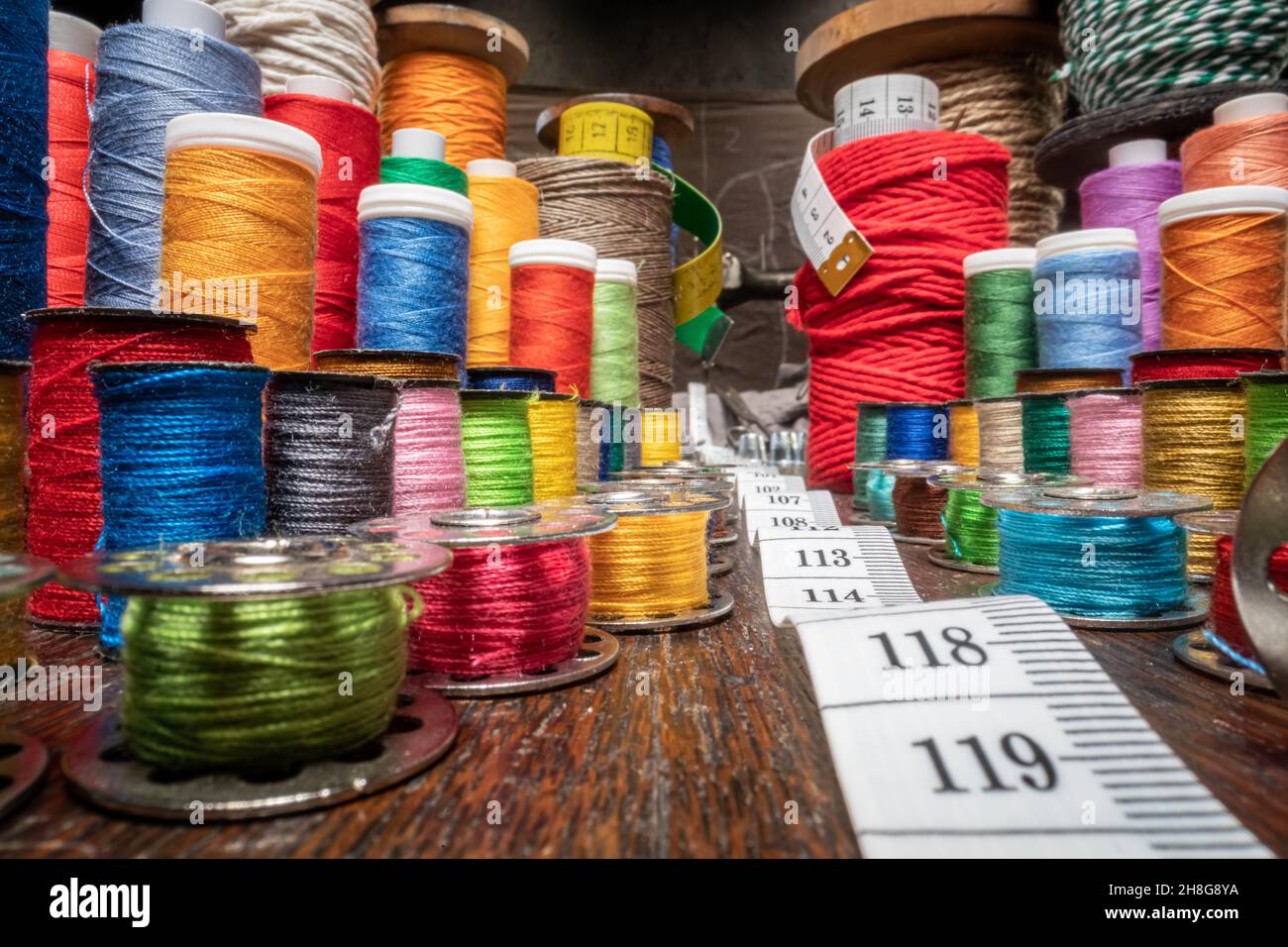 Antique tailor workshop sewing traditional individual clothes. Vintage ...