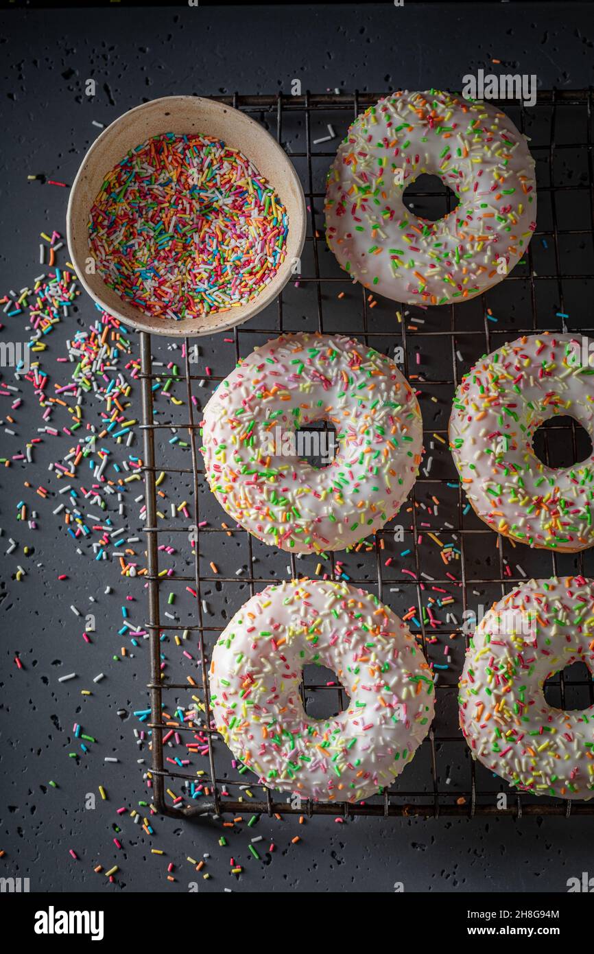 Sweet and yummy white donuts as perfect snack. Donuts is most popular ...
