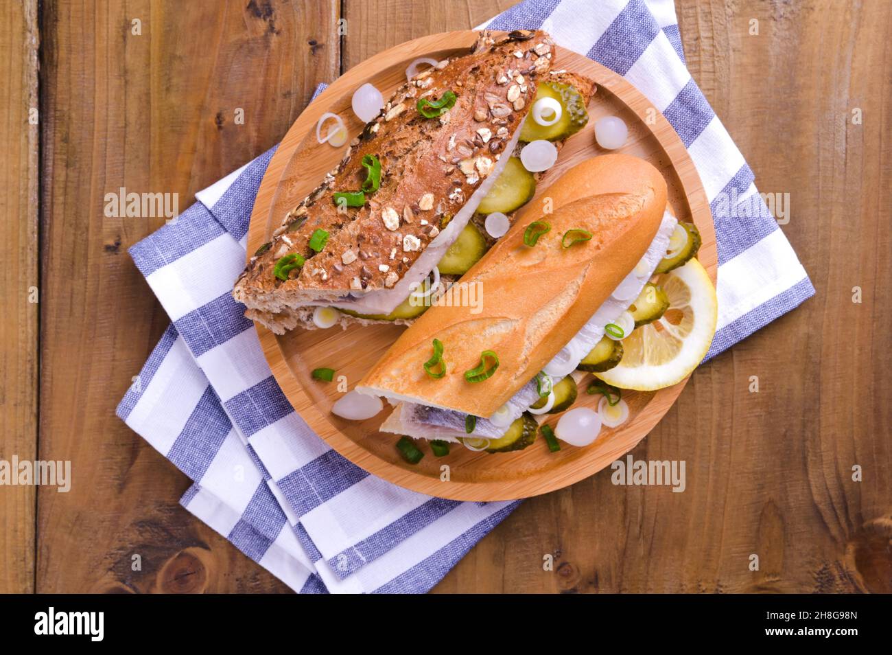 Dutch herring. Toast with Dutch herring, onions, pickles. Traditional ...