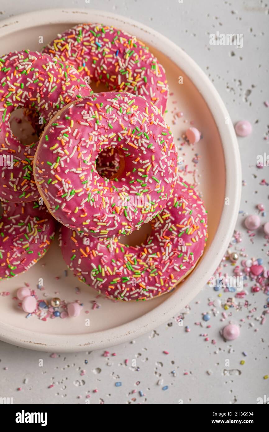 Sweet and yummy pink donuts as popular snack Donuts is most popular ...