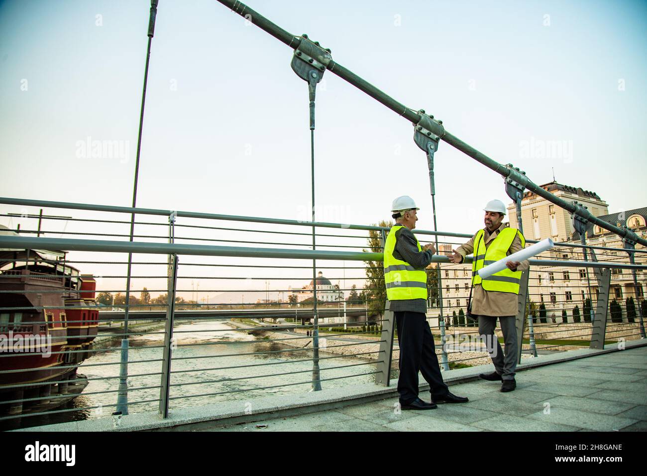 Engineer looking at bridge and plans hi-res stock photography and ...