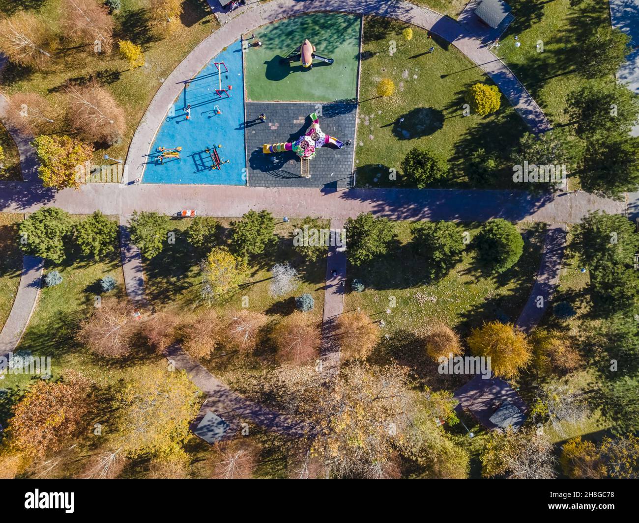Top down aerial view of a playground for children in a public park ...