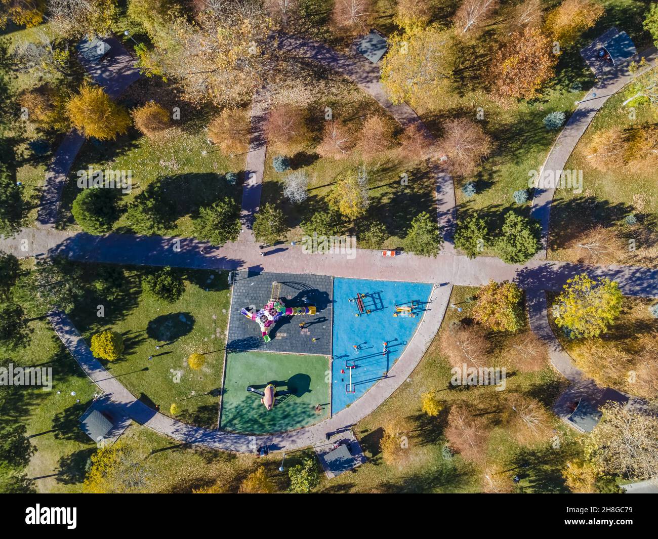 Top down aerial view of a playground for children in a public park ...