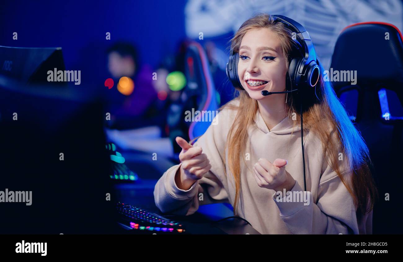 Happy streamer caucasian young woman professional cyber gamer online ...