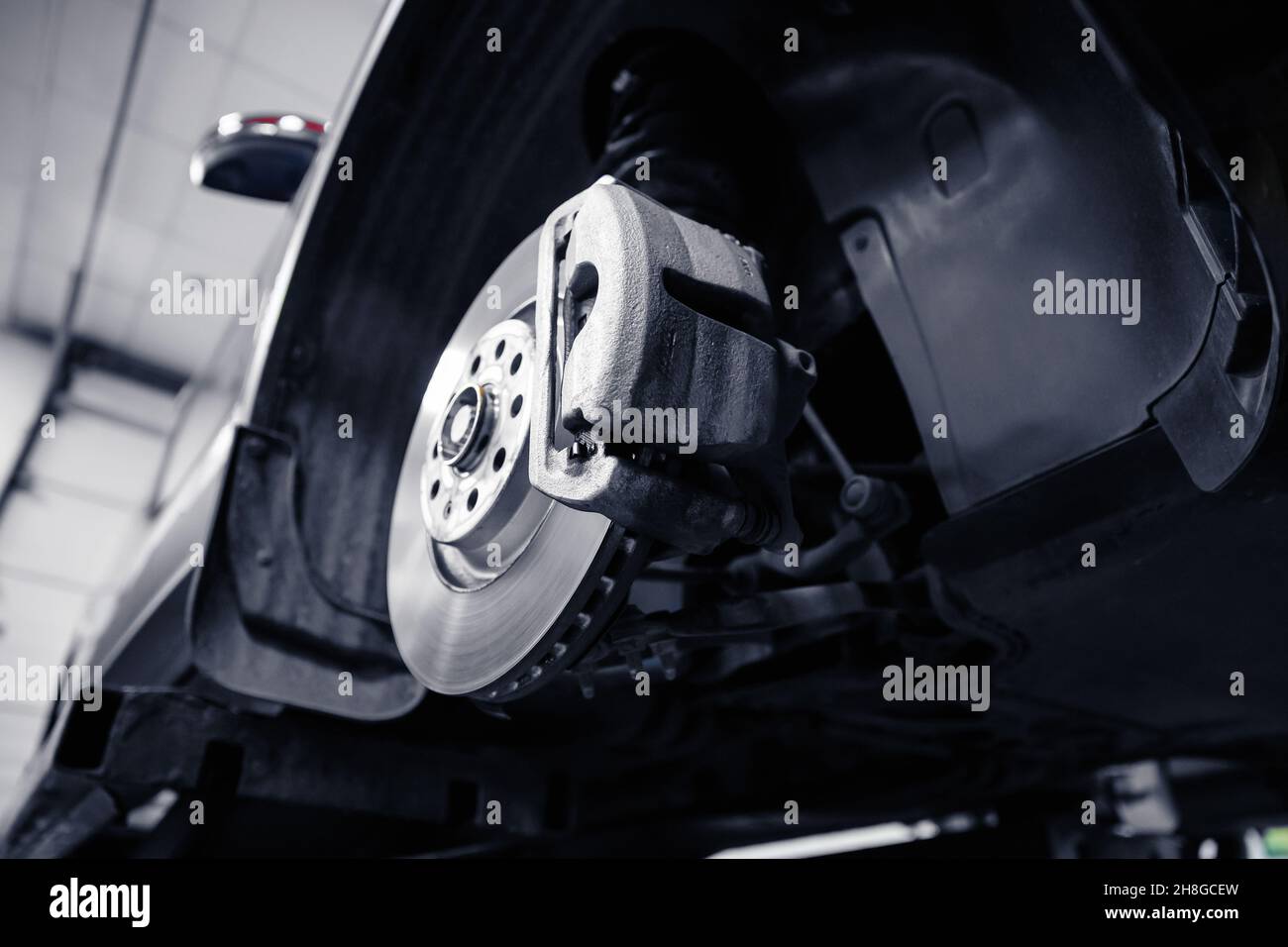 Closeup of steel brake disc in car service. Concept for replacing wheel ...