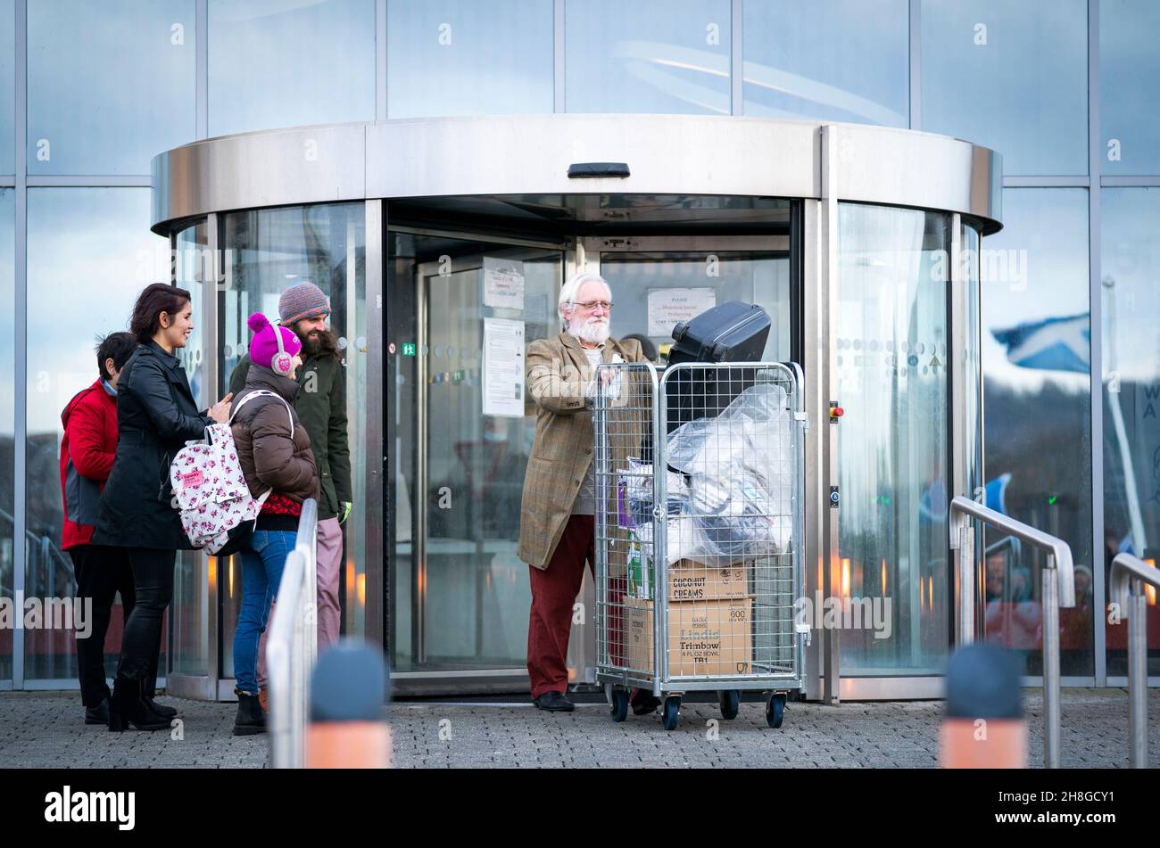 Former UK ambassador to Uzbekistan Craig Murray is met by his wife ...