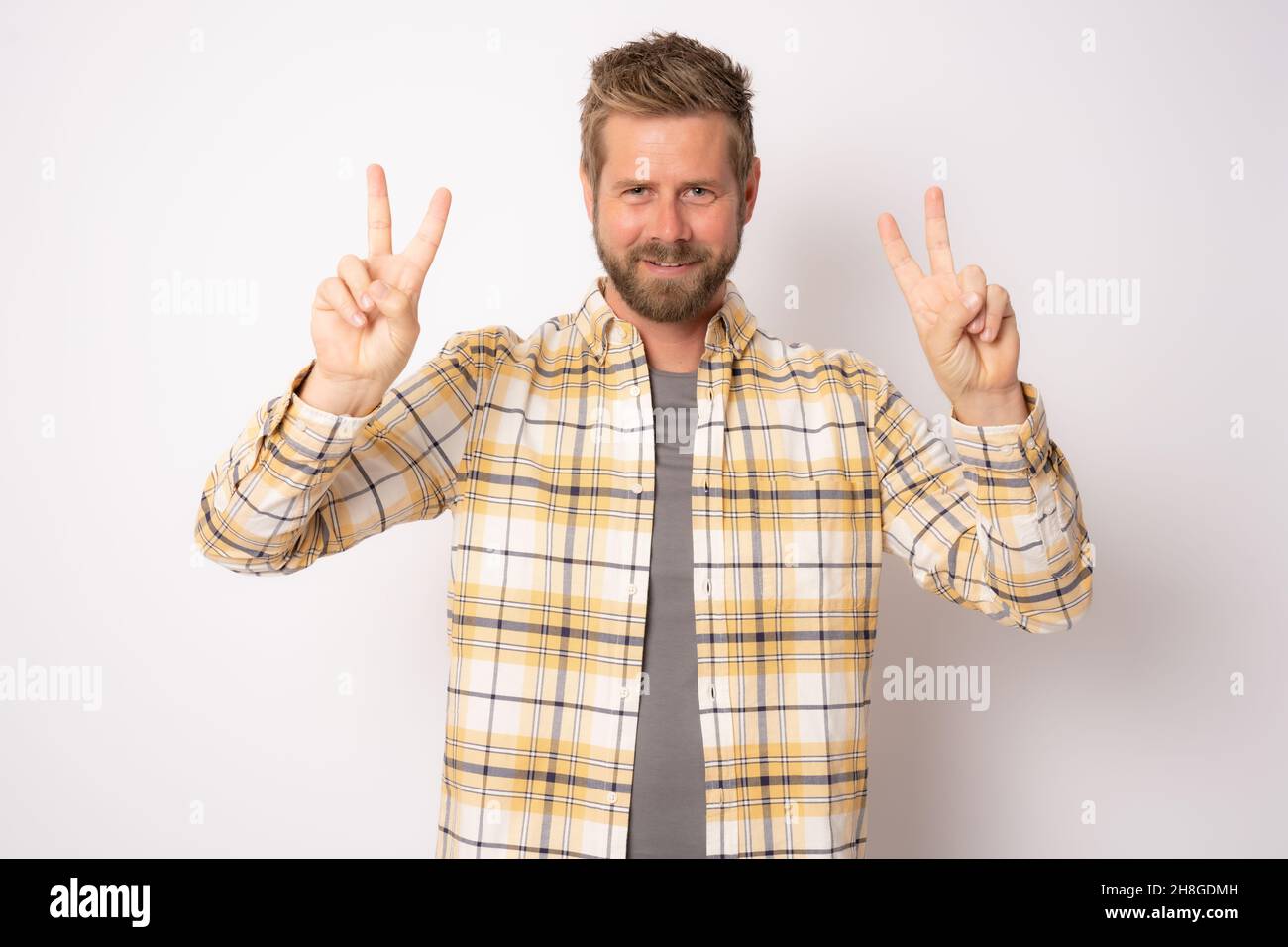 Man doing v sign hi-res stock photography and images - Alamy