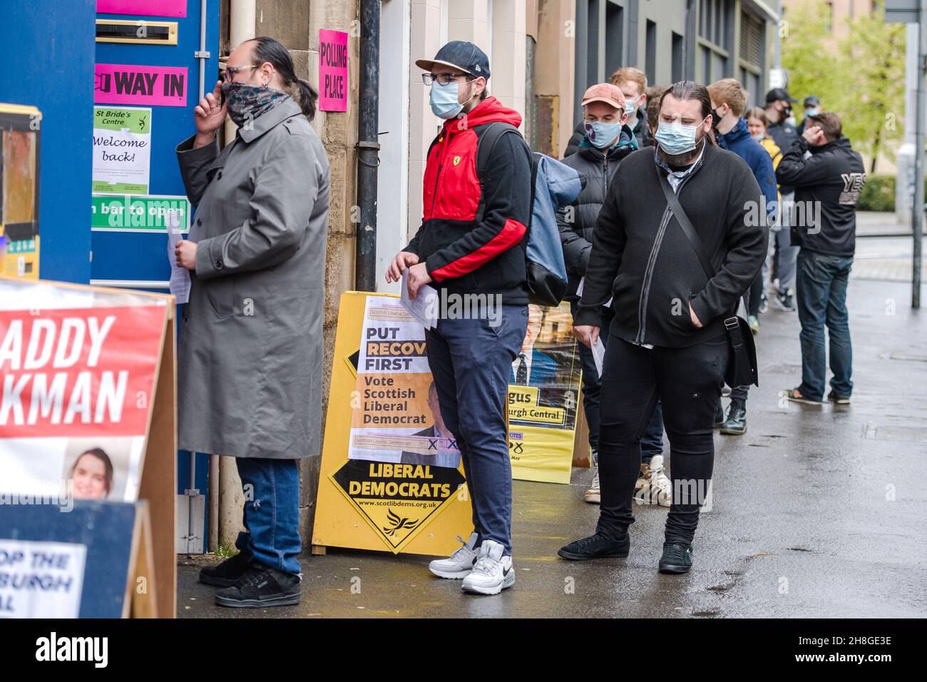 Public queue in masks at the polling station on Orwell Terrace to cast ...