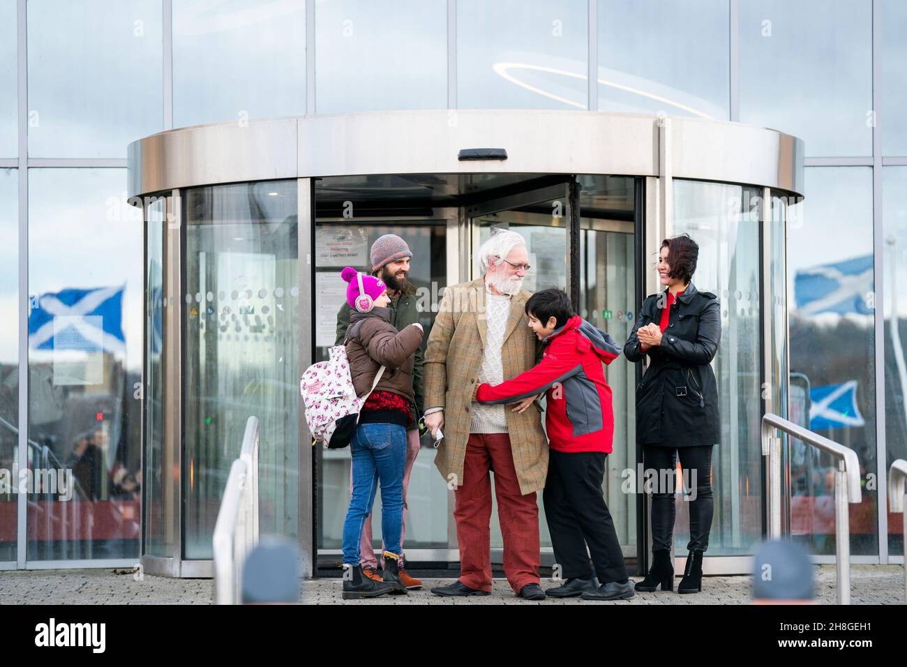 Former UK ambassador to Uzbekistan Craig Murray is met by his wife ...