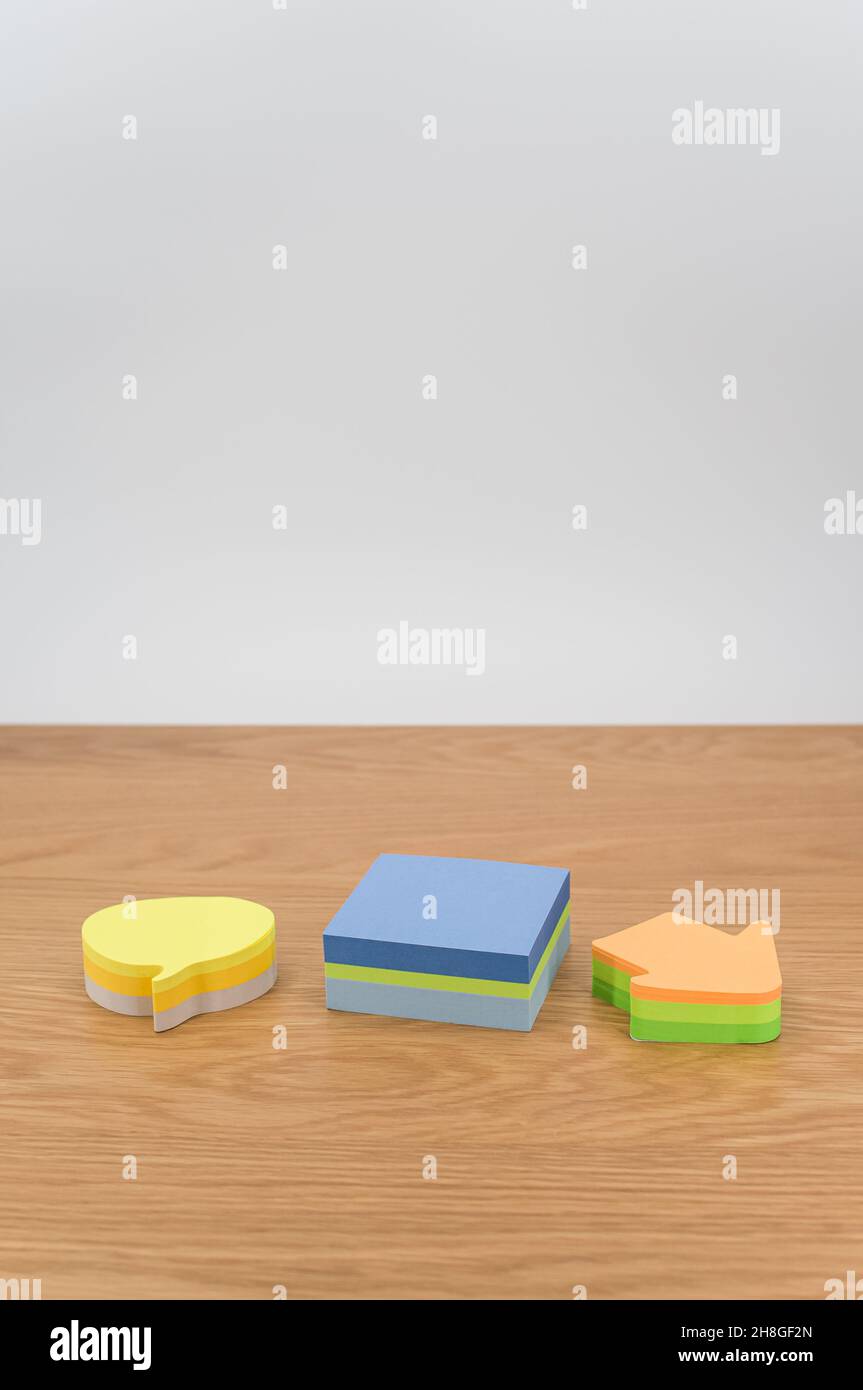blank and colorful sticky note sheets on a wooden background Stock ...
