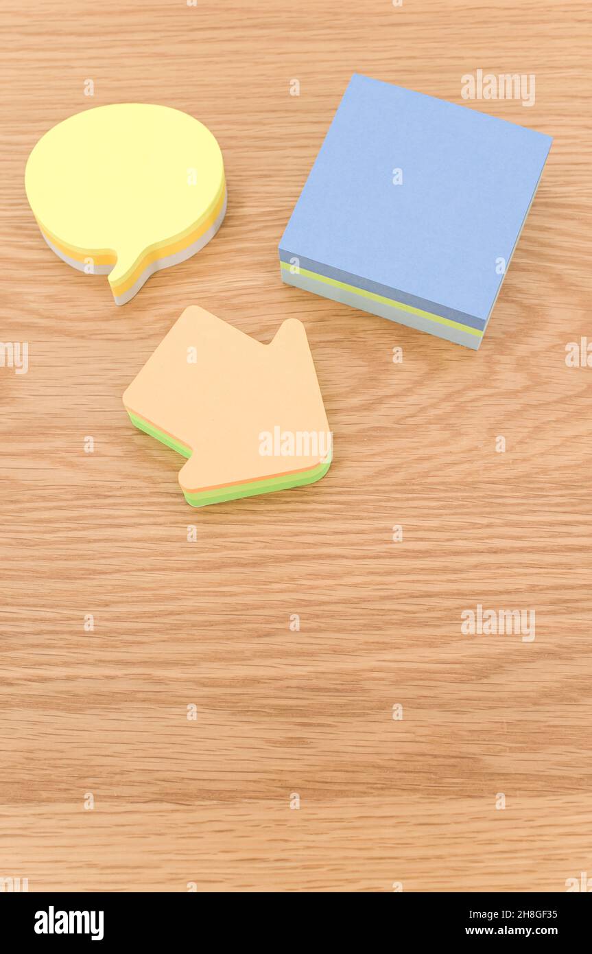blank and colorful sticky note sheets on a wooden background Stock ...