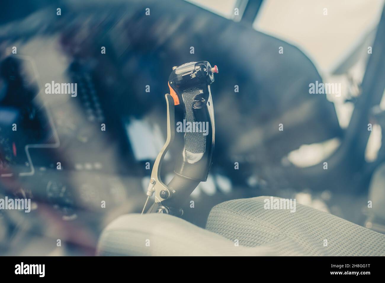 Helicopter control stick in the cockpit Stock Photo - Alamy