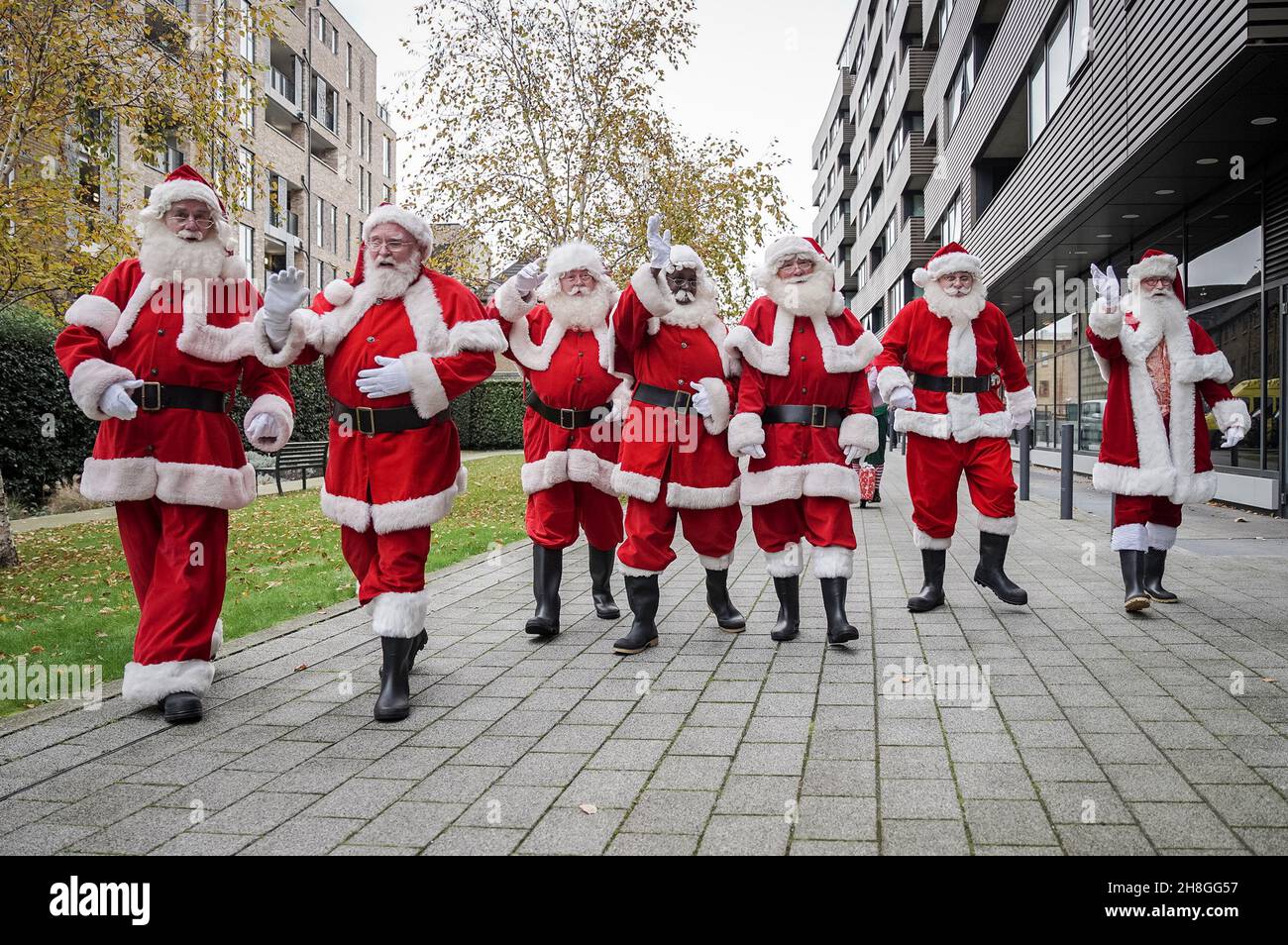 London, UK. 30th Nov 2021. Performers arrive to Santa School in east ...