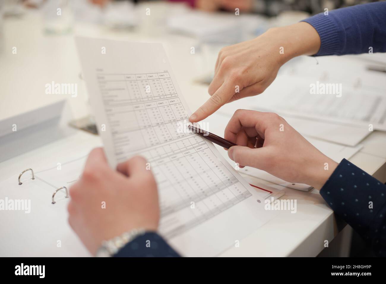 Hands documents desk pen to sign hi-res stock photography and images ...