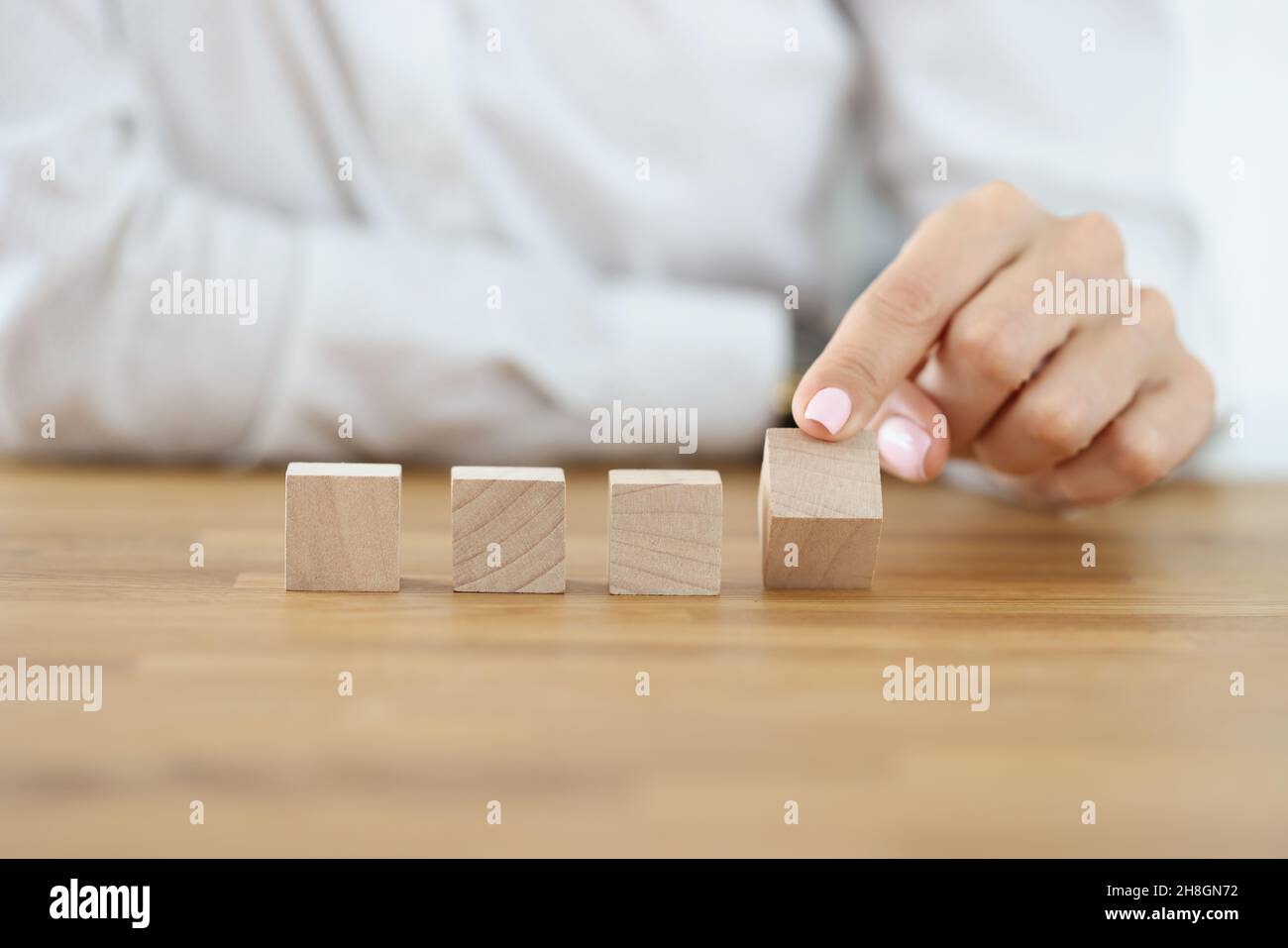Wooden cube flipping change hi-res stock photography and images - Alamy