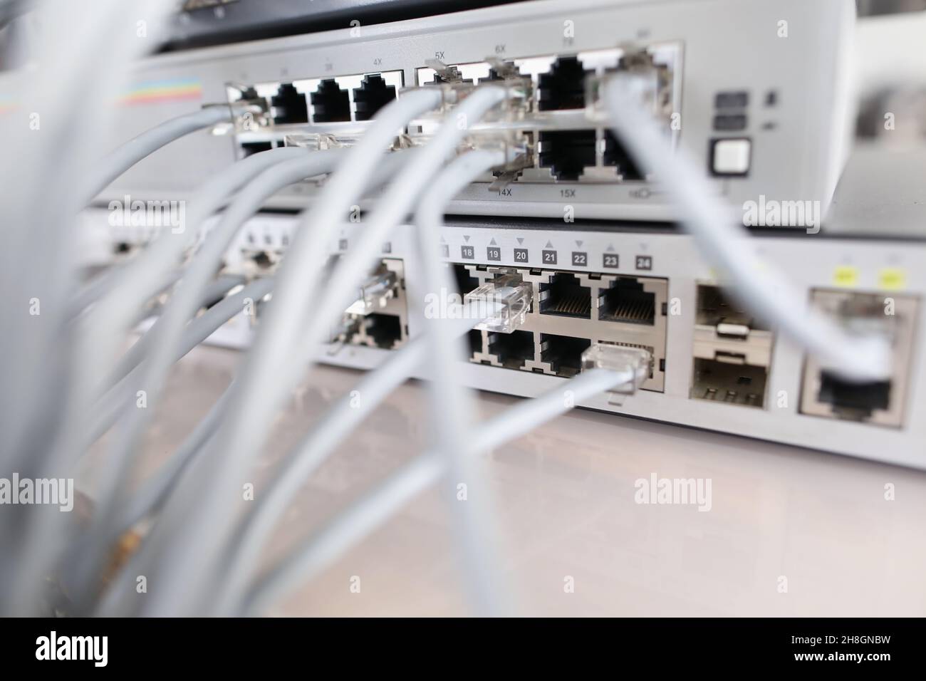 Set of cable network connected to internet switch servers in center ...
