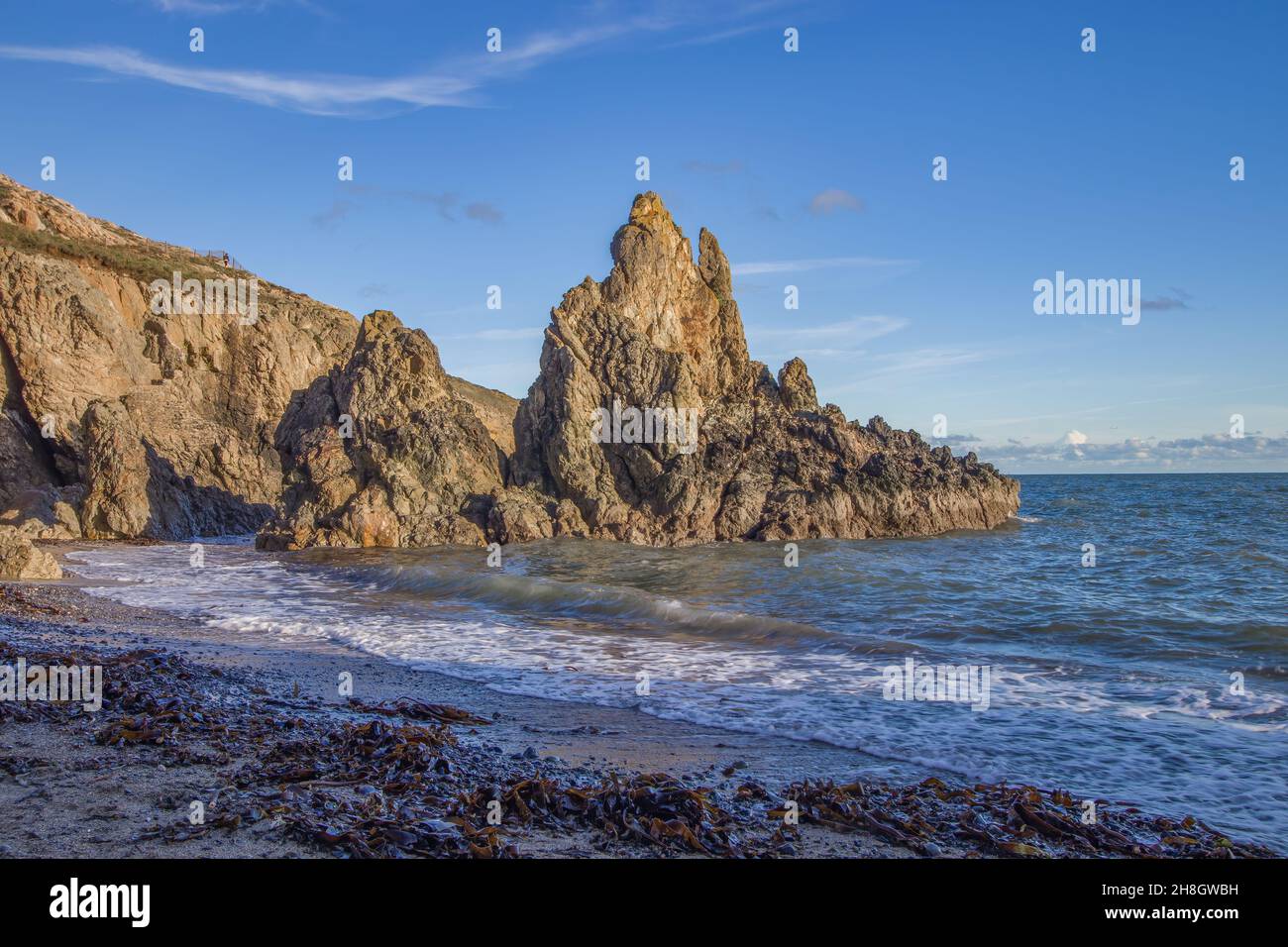 The Peninsula of Howth Head in sunny and cloudy day, hidden bay ...