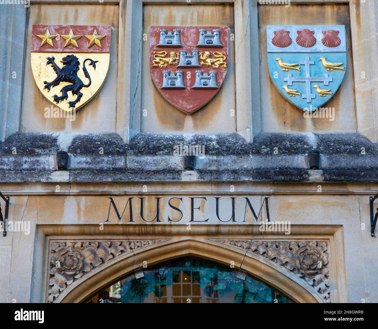 Winchester, UK - November 28th 2021: Sign and coat of arms badges above ...